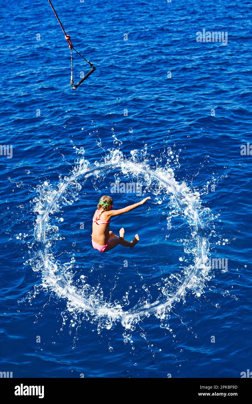 bungee jumping into the Atlantic Ocean in a circle of spray Stock Photo ...