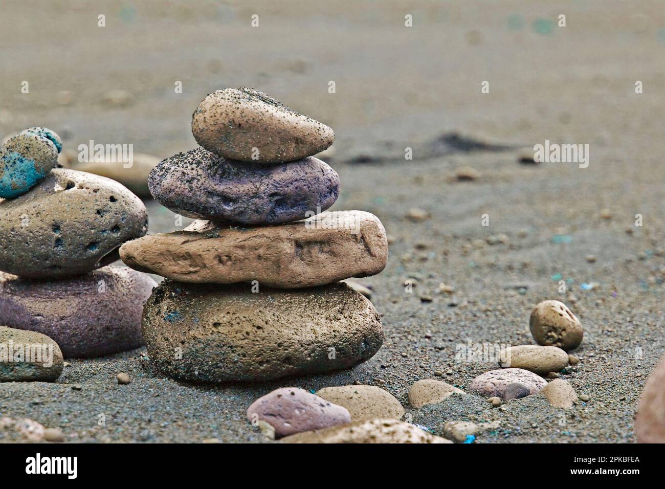 balance of wet volcanic rocks on the ocean Stock Photo - Alamy