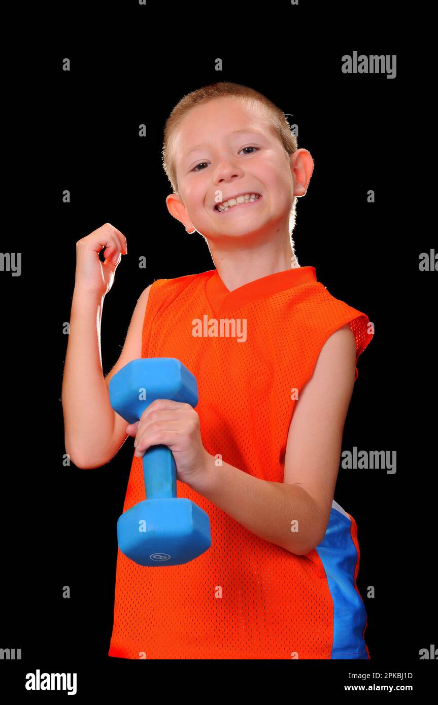 A Young boy fitness training with weights Stock Photo - Alamy