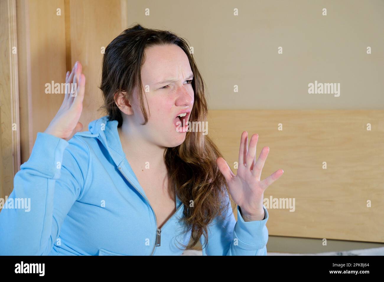 Do not miss. Young casual teen girl shouting. Shout. Crying emotional ...