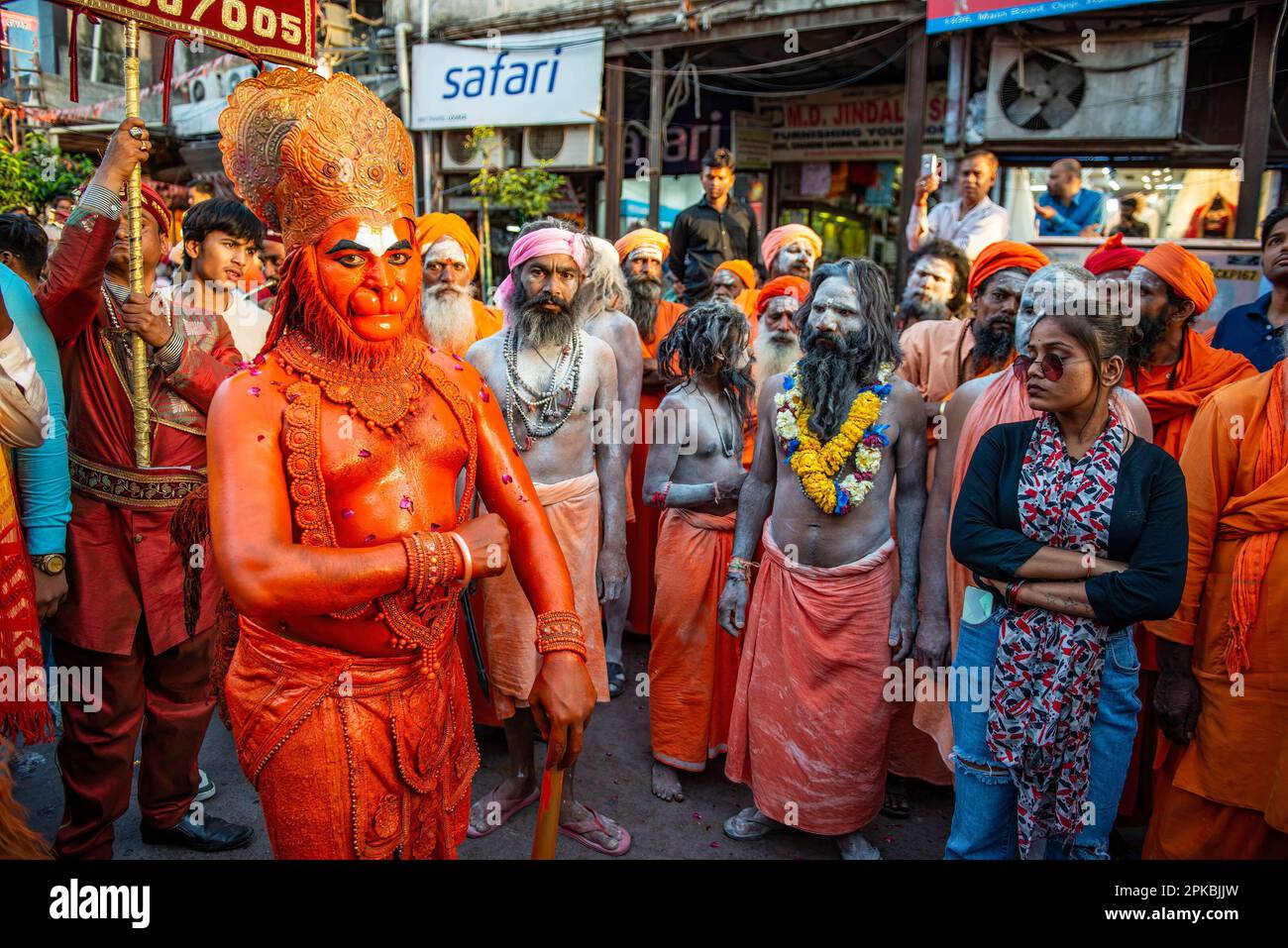 An Indian Hindu devotee dressed as the monkey god, Hanuman while locals ...