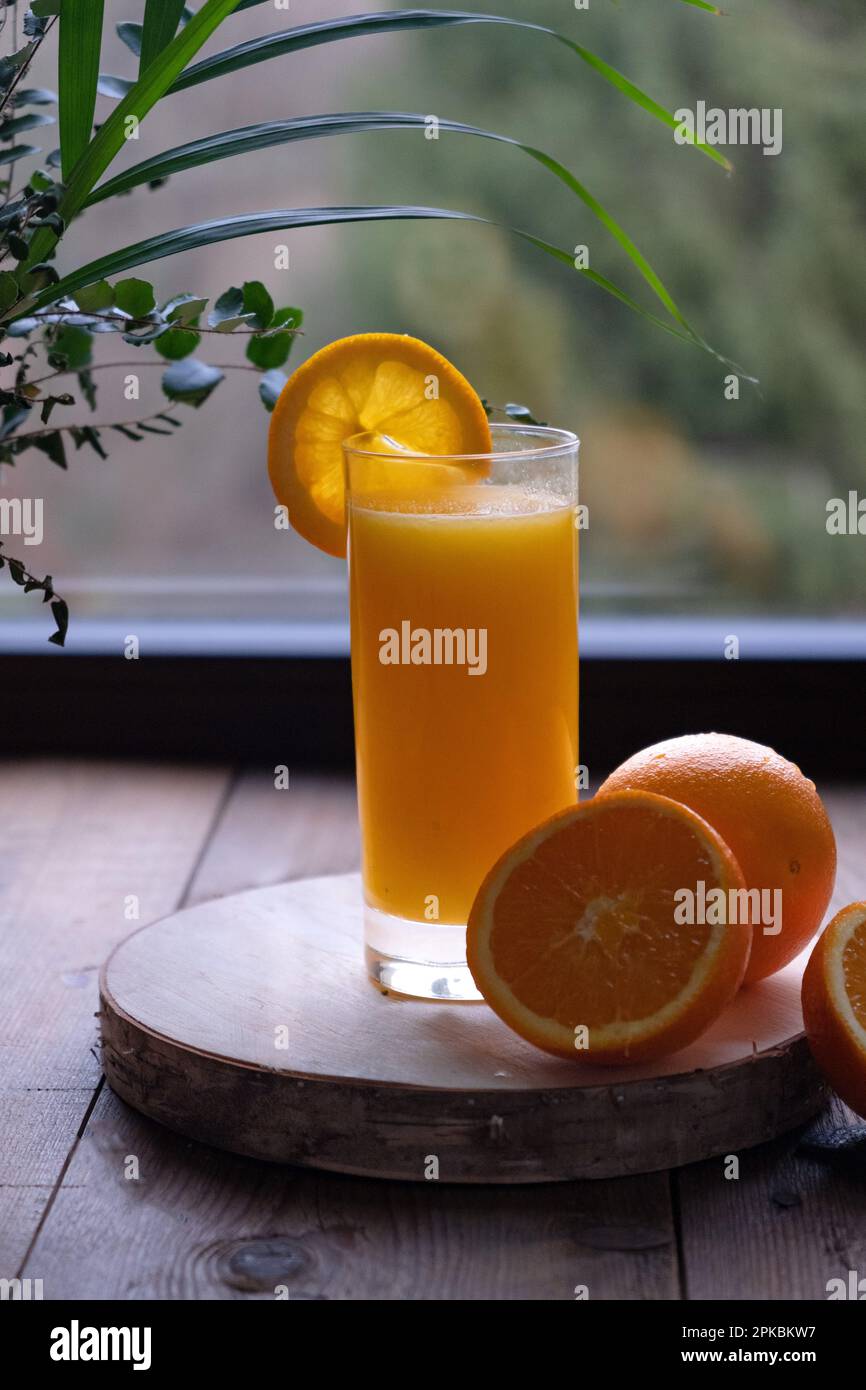 Freshly cut juicy orange hi-res stock photography and images - Alamy