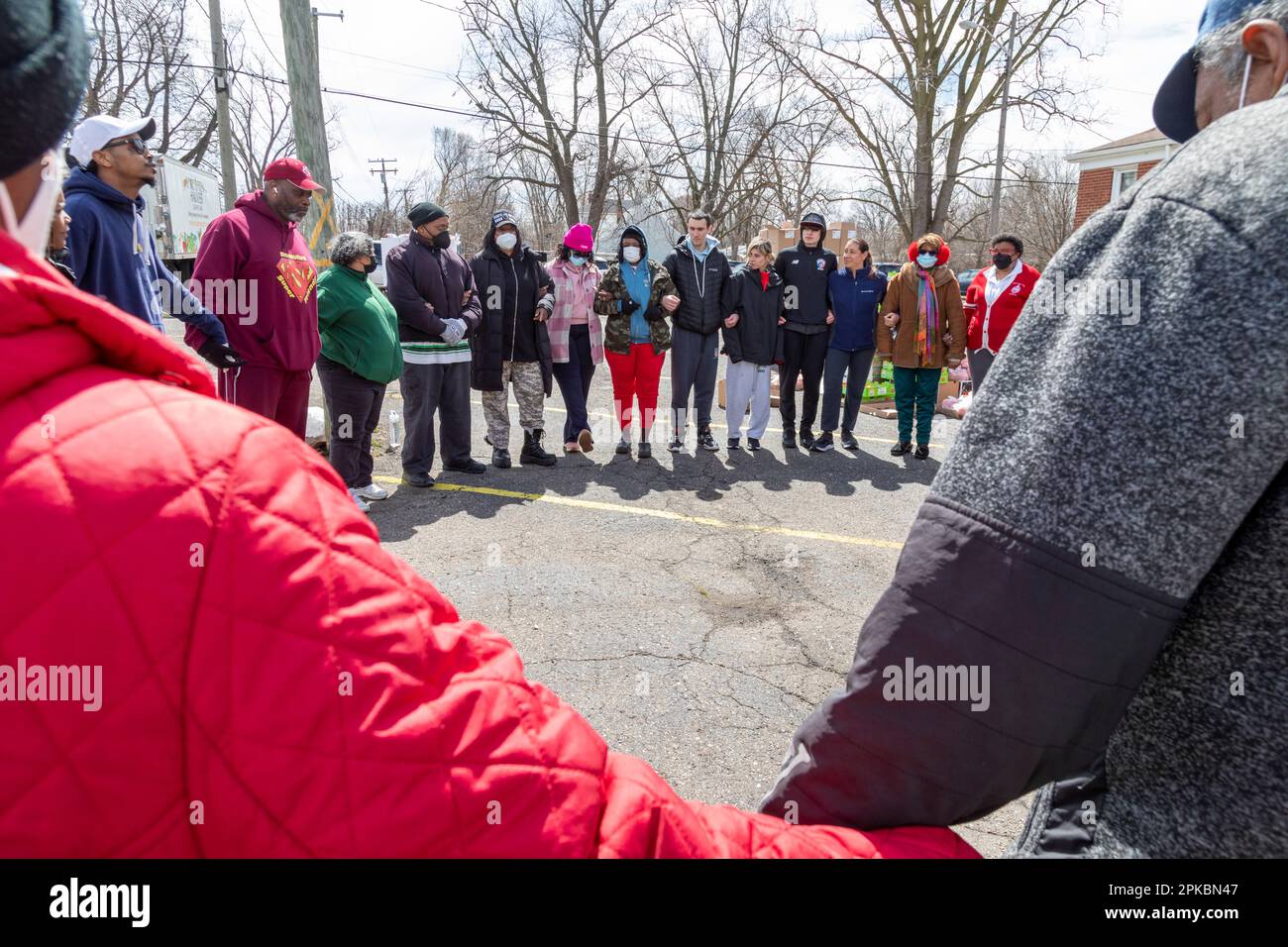 Inkster, Michigan, USA. 6th Apr, 2023. Volunteers pray outside Womack ...