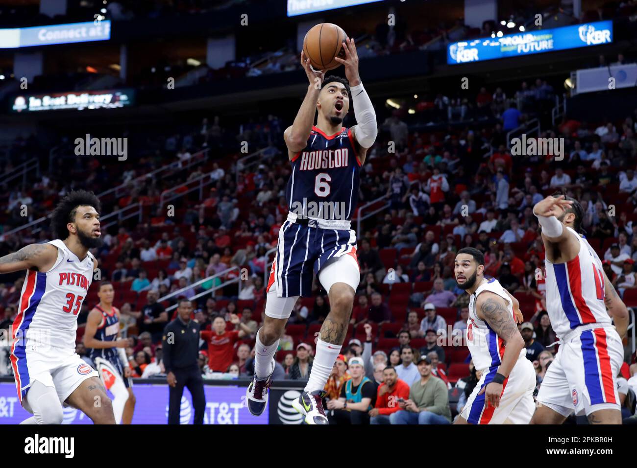 Houston Rockets forward K.J. Martin (6) puts up a shot between Detroit ...