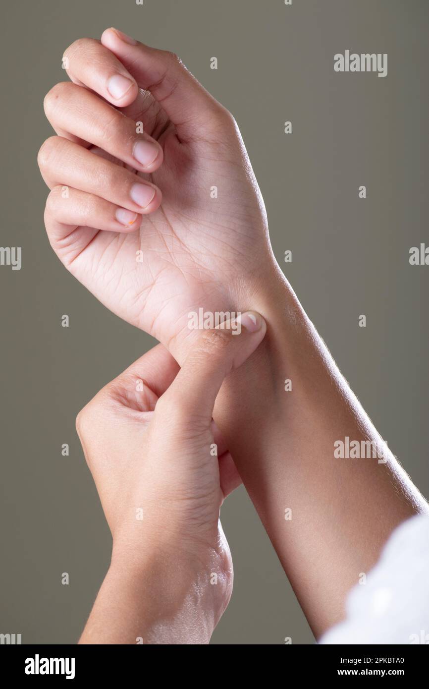 Self Checking heart pulse cardio health concept Stock Photo - Alamy