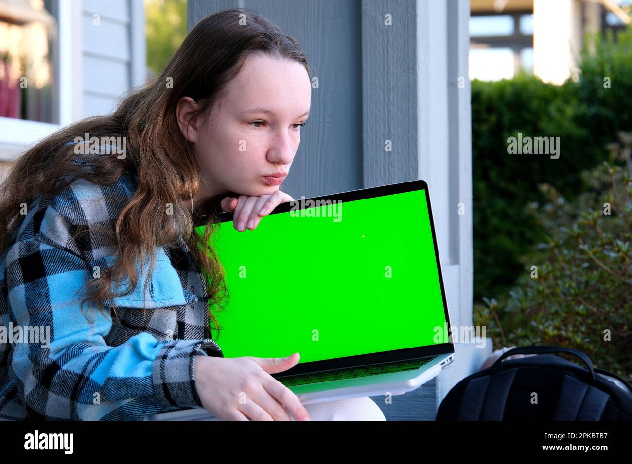 young pretty student woman bored tired over worked on her laptop ...