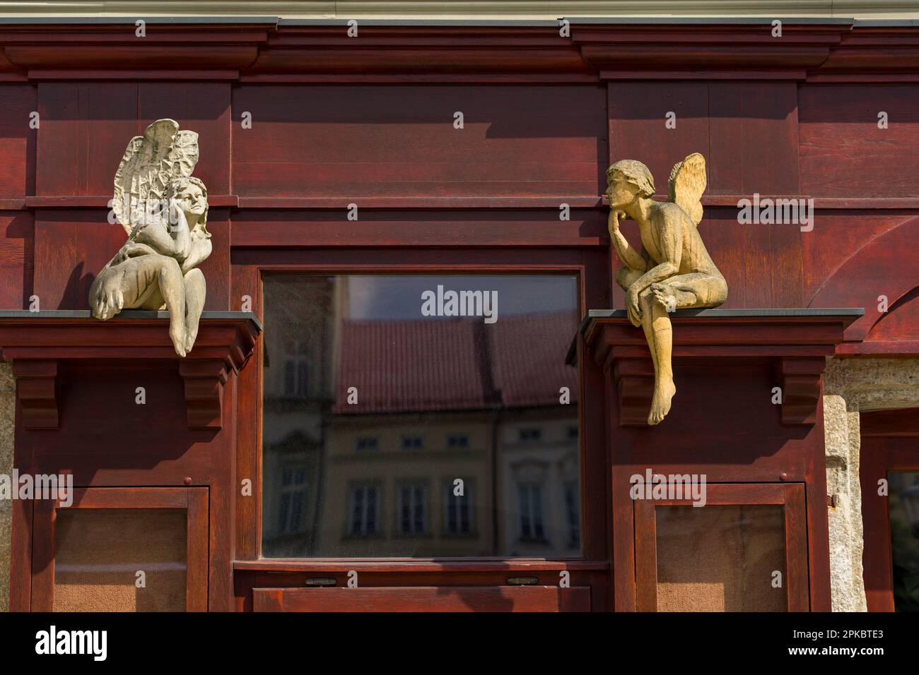 Two angels, two elves, in love, sculptures on the facade, on the Market ...