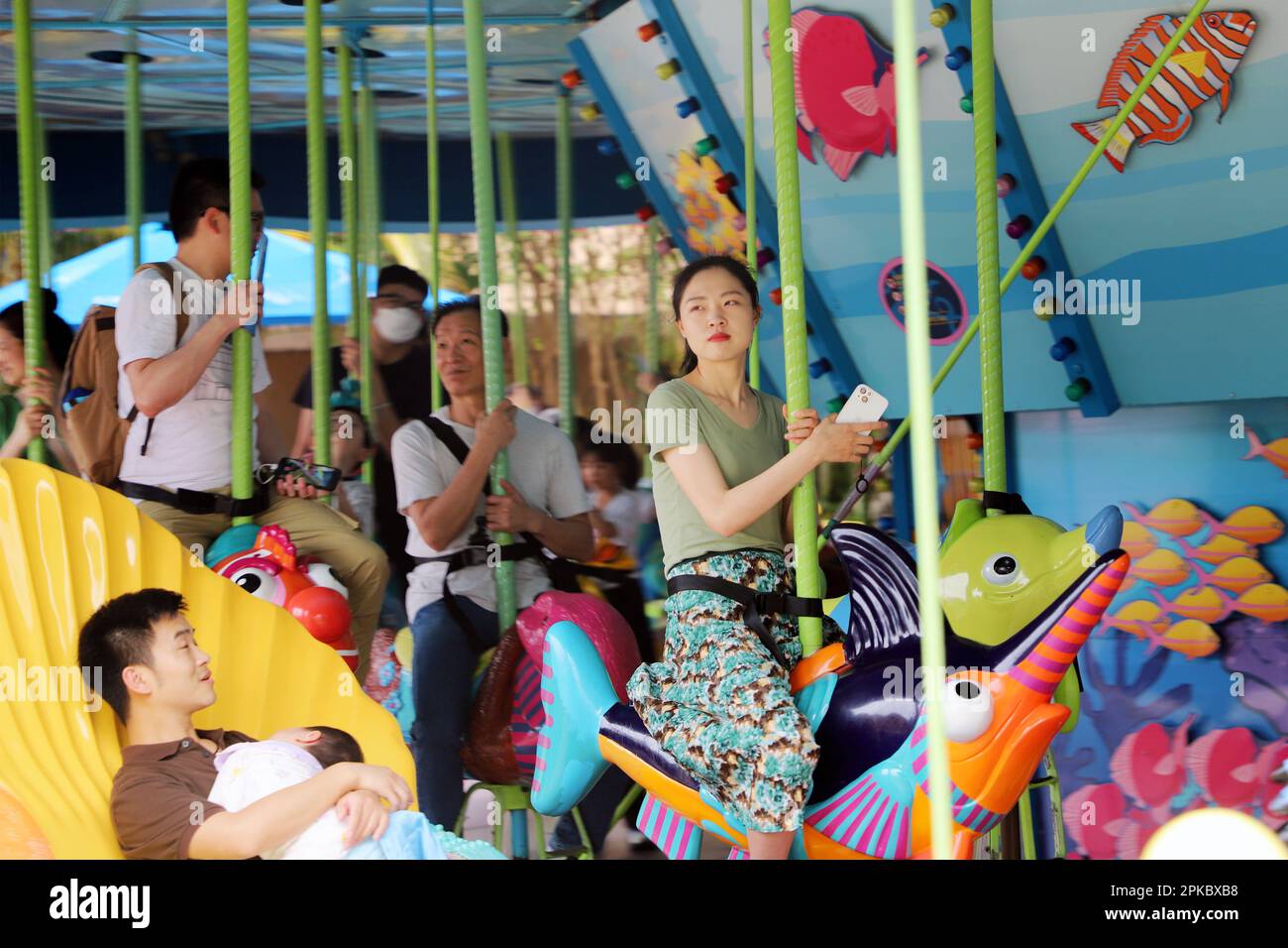 ZHUHAI, CHINA - APRIL 6, 2023 - Parents and children view rare Marine ...