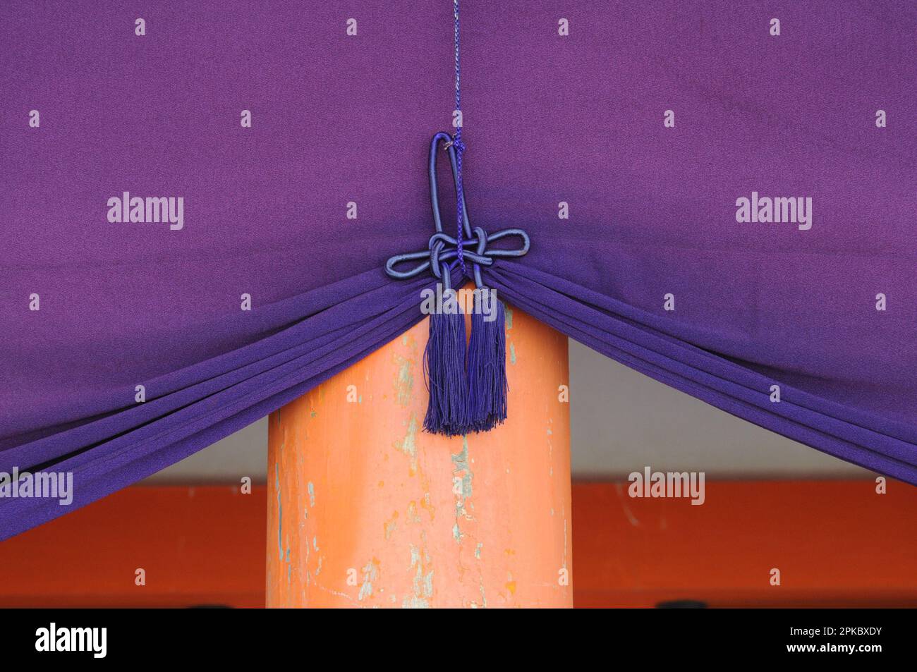 Details of a wooden column and the temples that decorate it, at ...