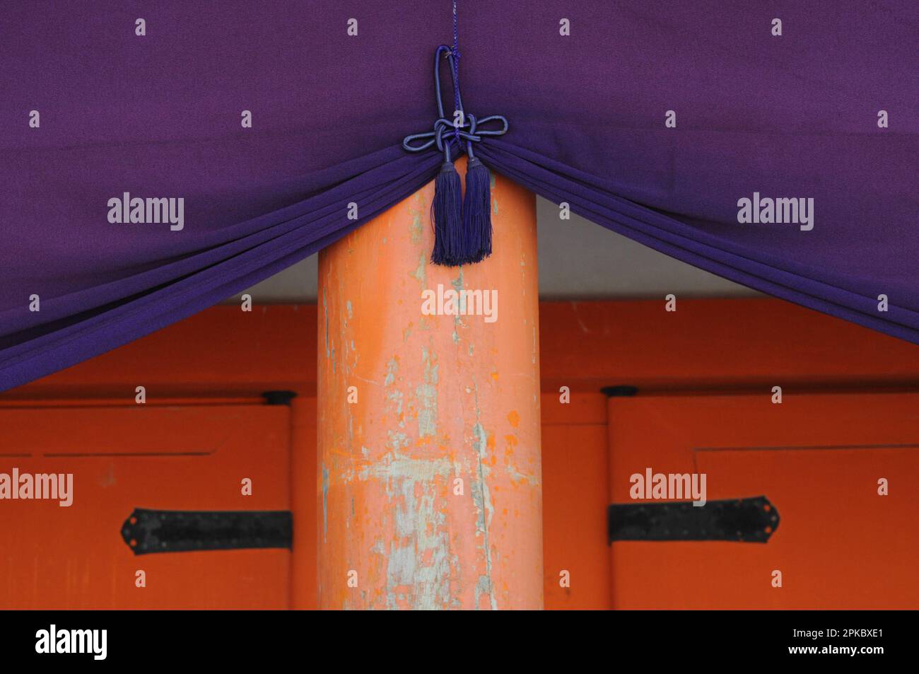 Details of a wooden column and the temples that decorate it, at ...