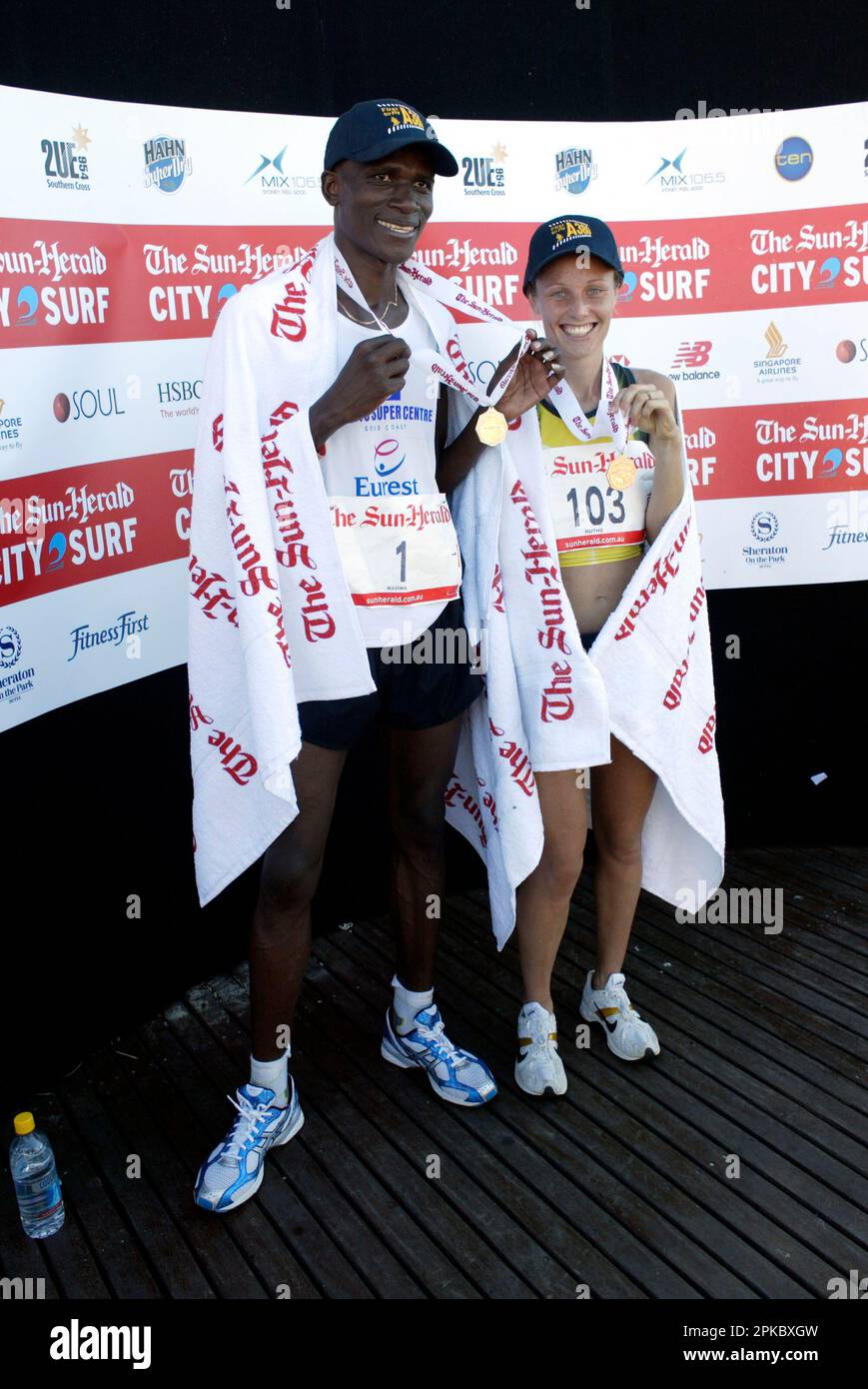 Tanzania's Dickson Marwa, winner of the mens race, and New Zealand's ...