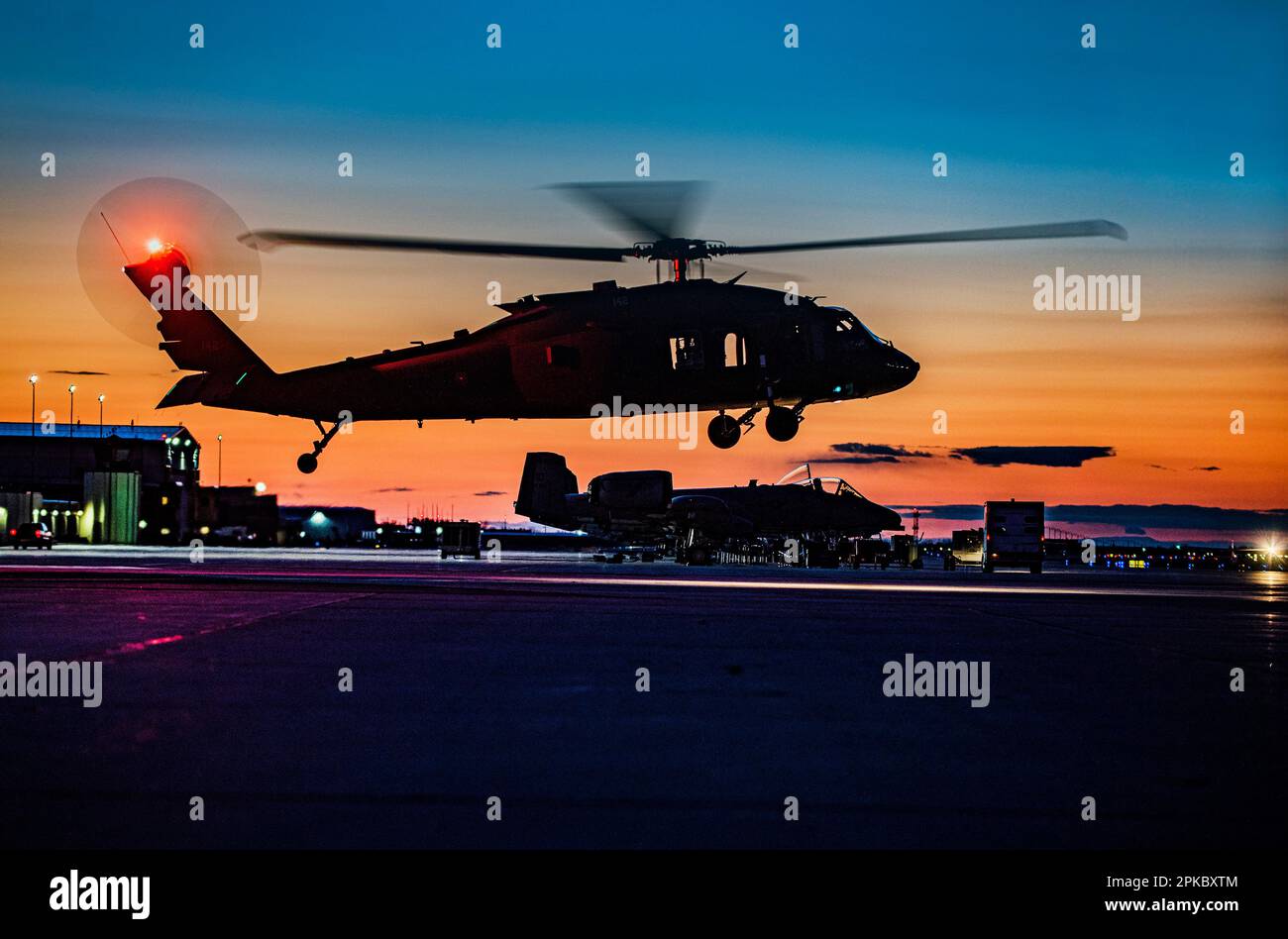 Idaho National Guard pilots take off in UH-60 Black Hawk helicopters on ...