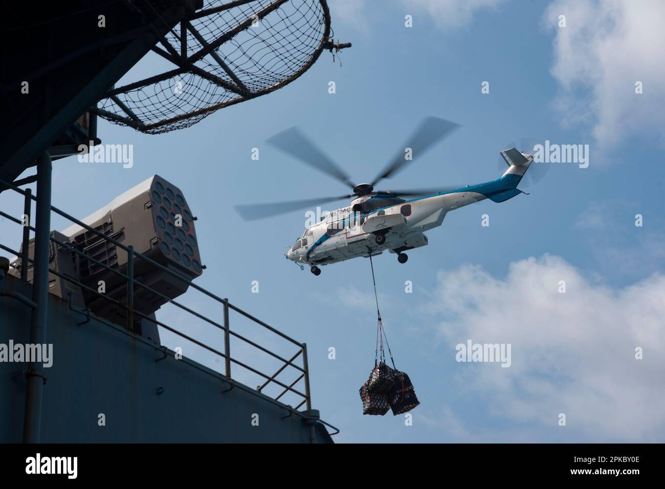 230406-N-WM182-1018 EAST CHINA SEA (April 6, 2023) A helicopter air ...
