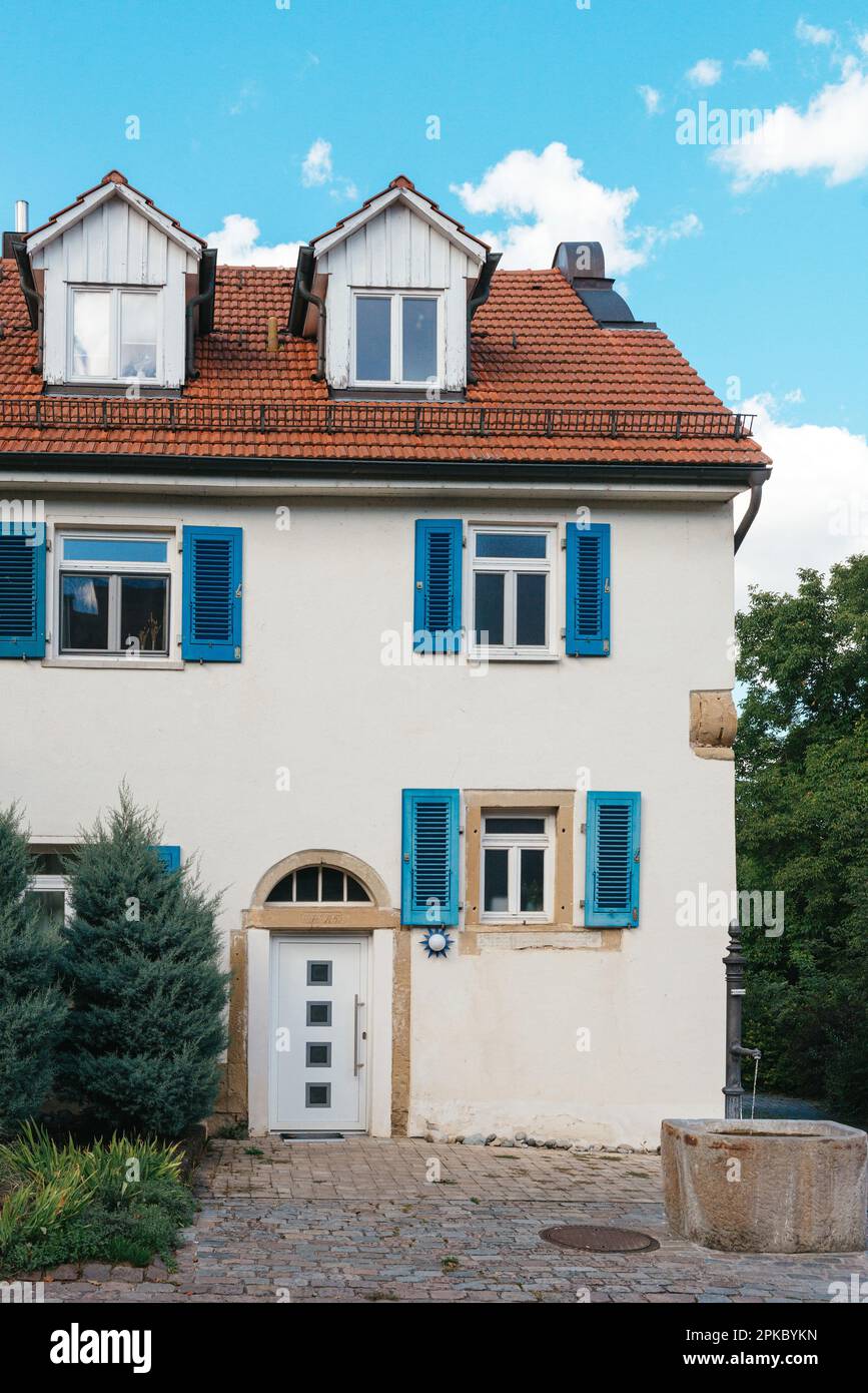Traditional small house with beautiful outdoor decor facade in Germany ...
