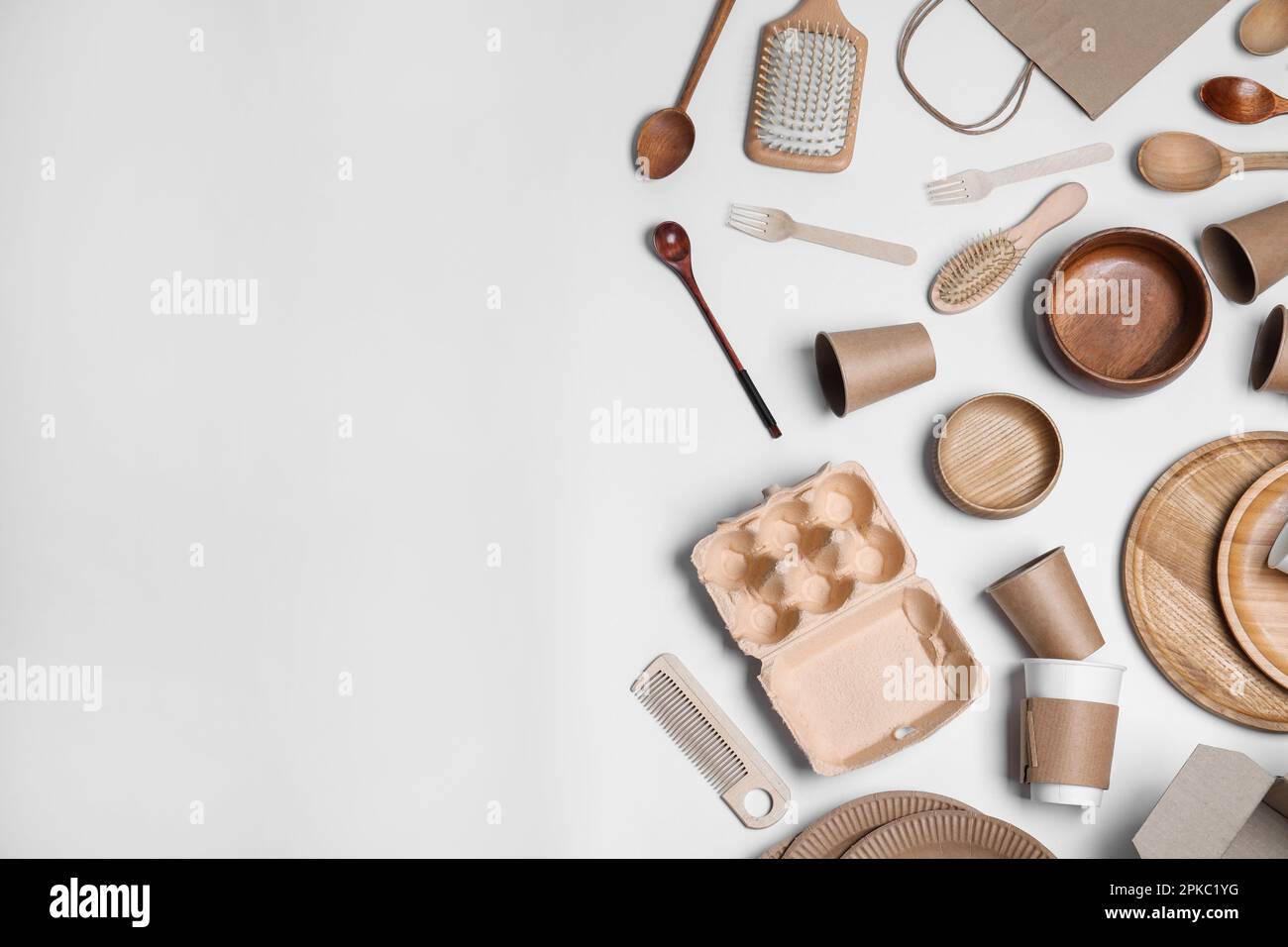 Different eco items on white background, flat lay and space for text ...