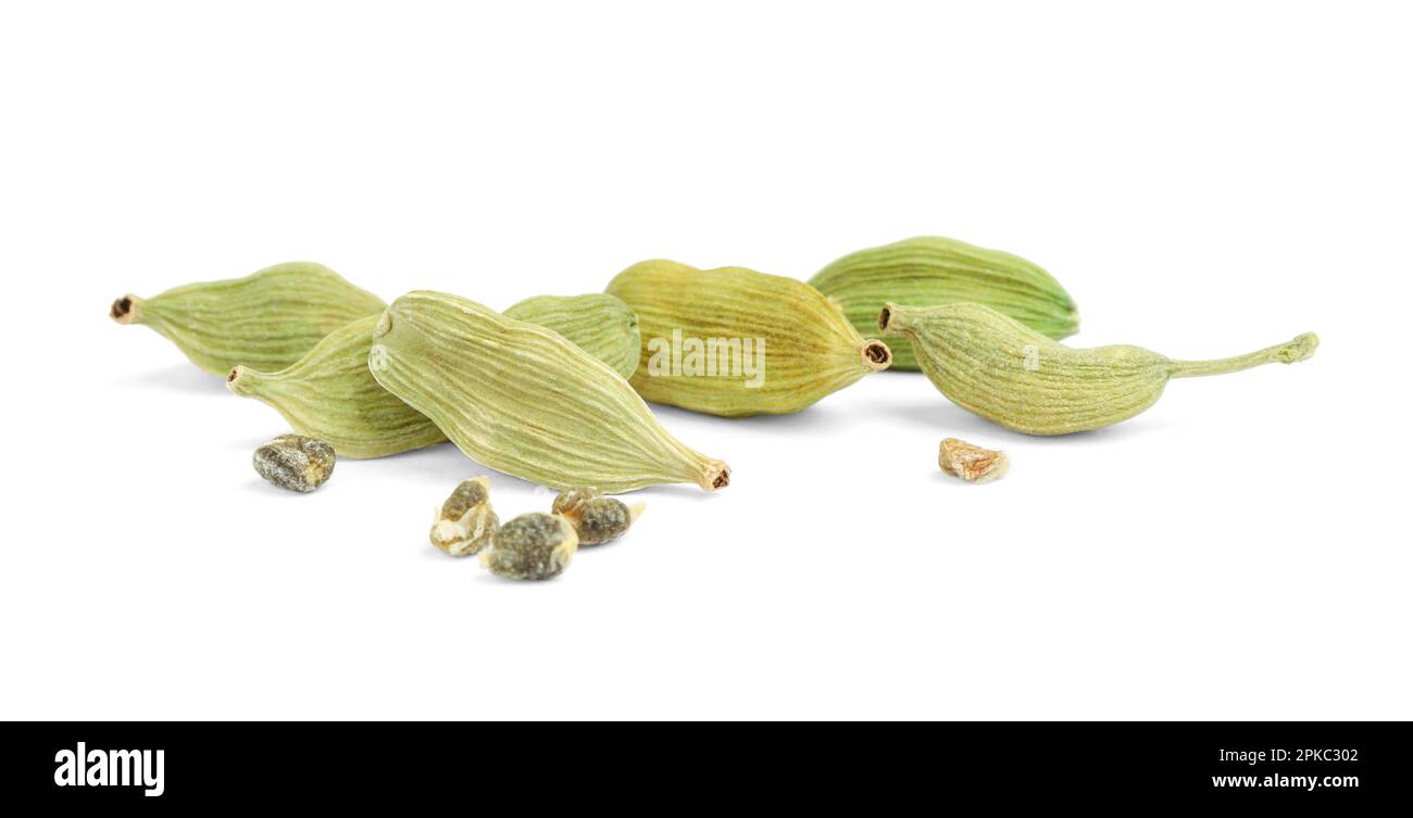 Pile of dry green cardamom pods isolated on white Stock Photo - Alamy