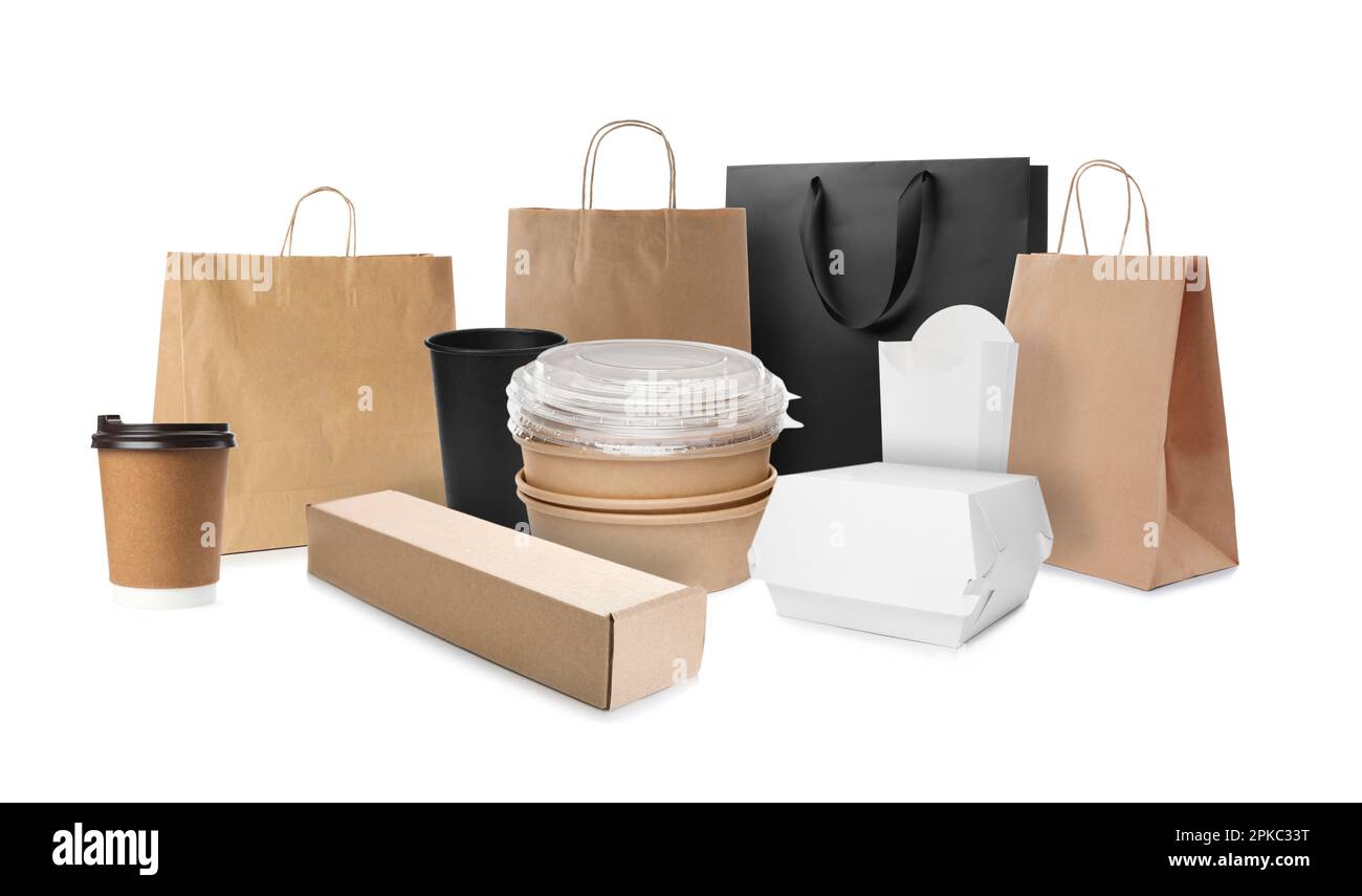 Set with different paper bags, containers for food and takeaway cups on ...