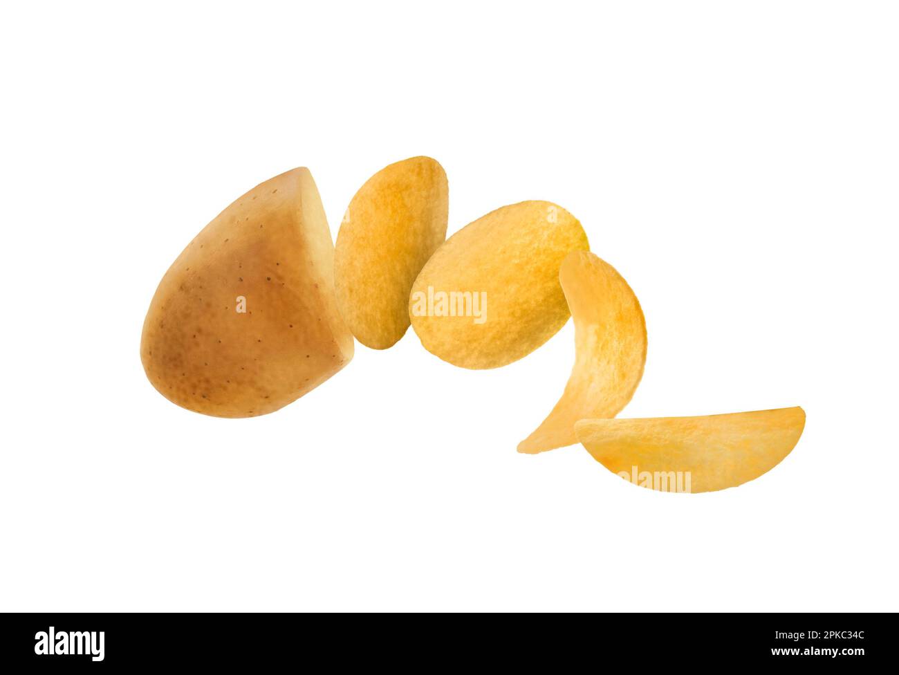 Raw potato turning into tasty crispy chips on white background Stock ...