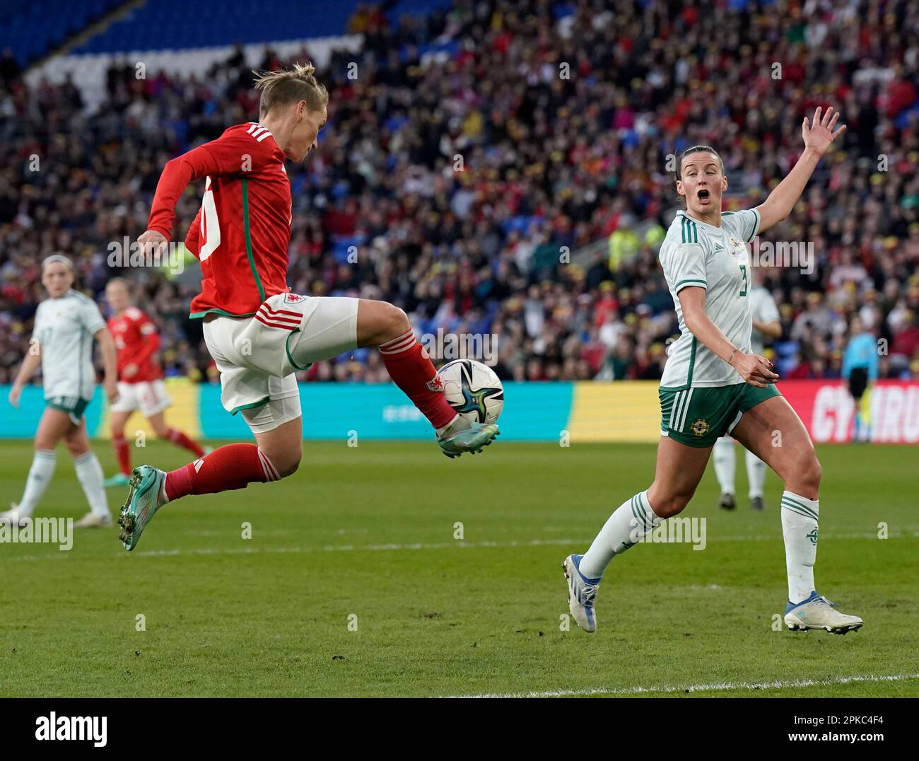 Cardiff, Wales, 6, April, 2023, Jess Fishlock (Wales) (L) controls ball ...