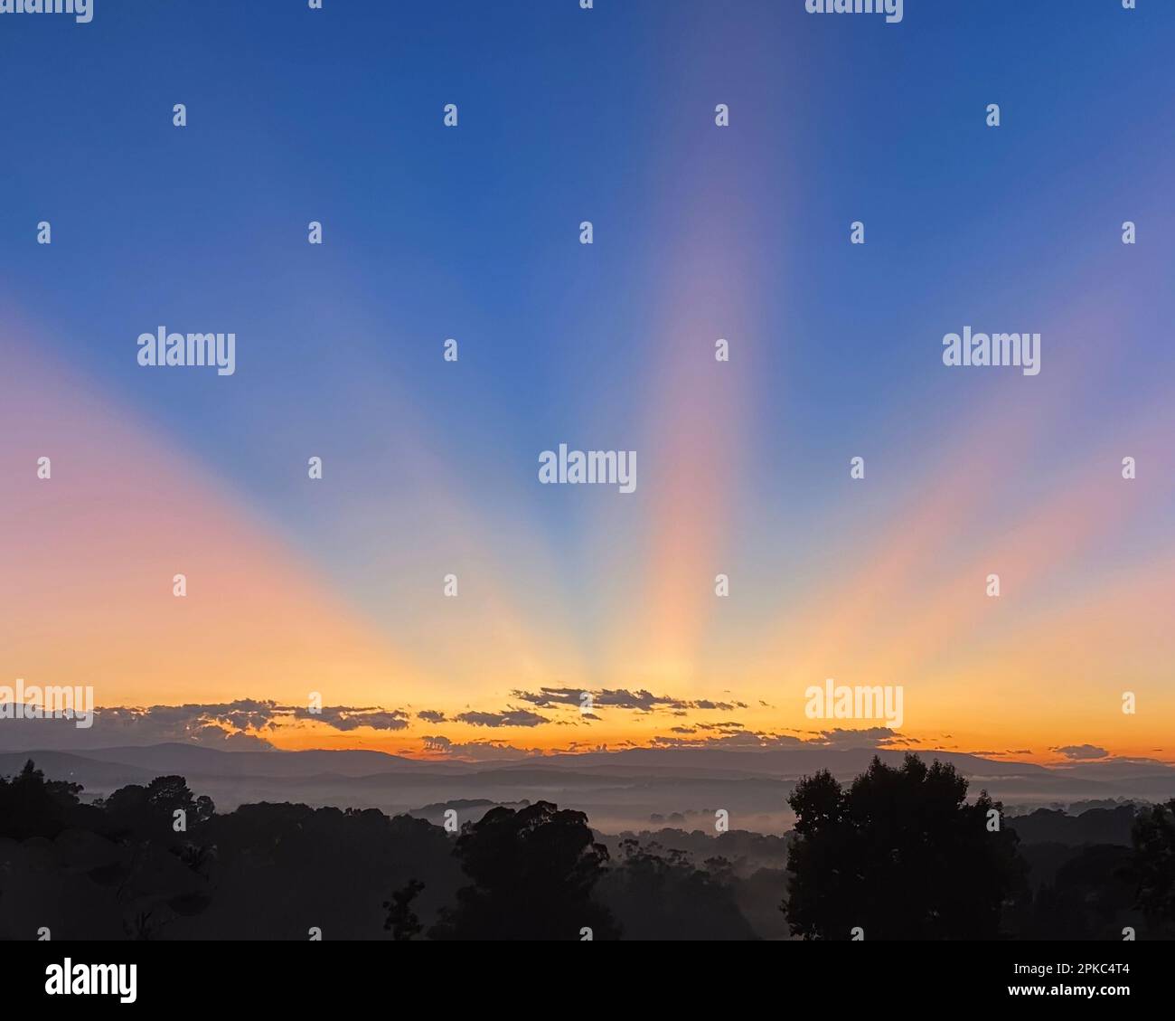 Dramatic and beautiful rays at sunrise Stock Photo - Alamy