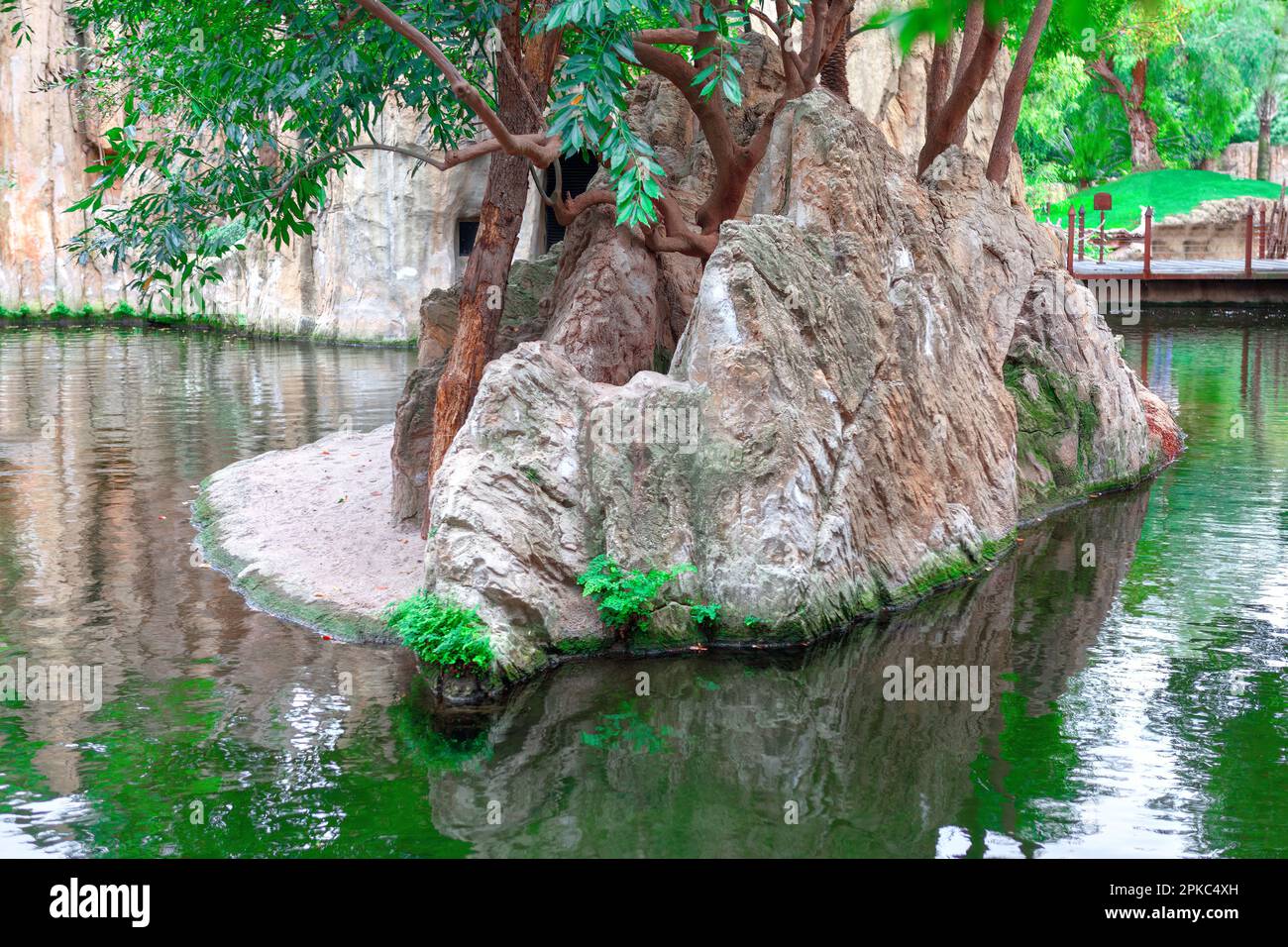 Large natural rock in the water . Wildlife nature reserve Stock Photo ...