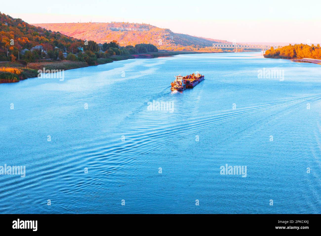 Nautical vessel at flowing river . Blue river water scenery Stock Photo ...