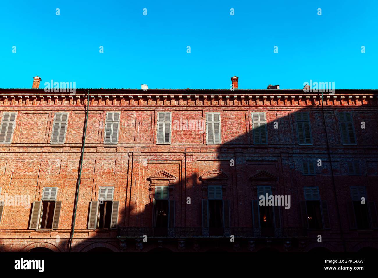 Shadow at red brick building . Facade of brick house Stock Photo - Alamy
