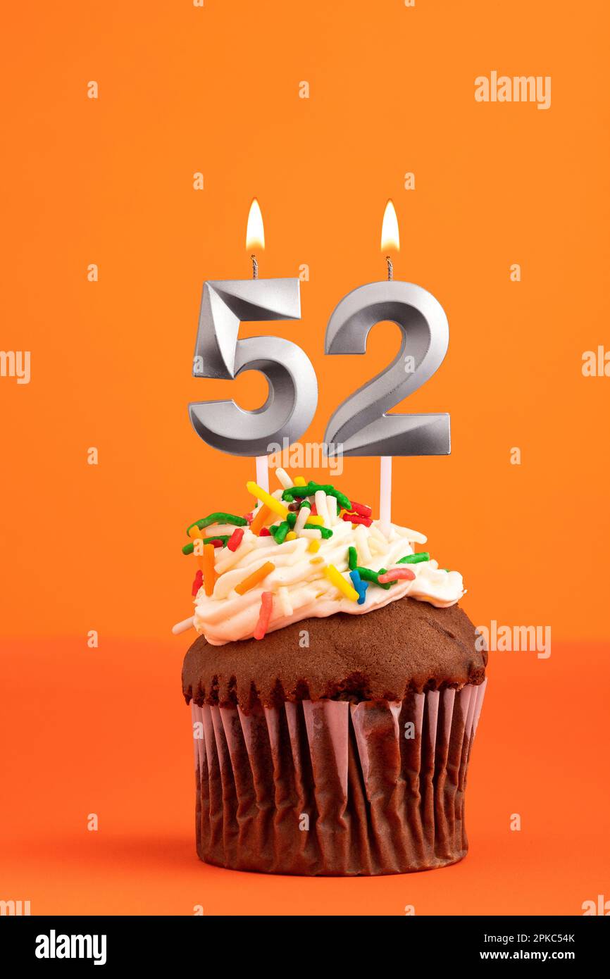 Birthday cake with candle number 52 - Orange foamy background Stock ...