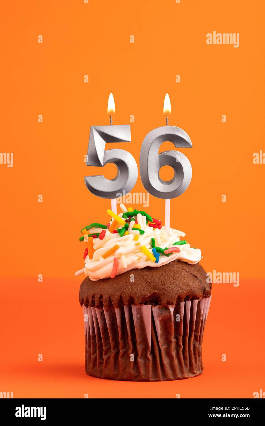 Birthday cake with candle number 56 - Orange foamy background Stock ...
