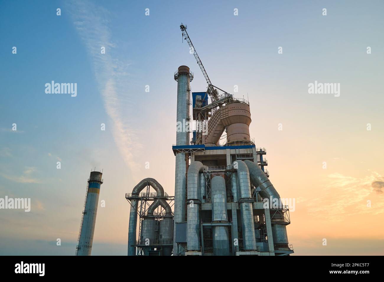 Aerial view of cement factory with high concrete plant structure and ...