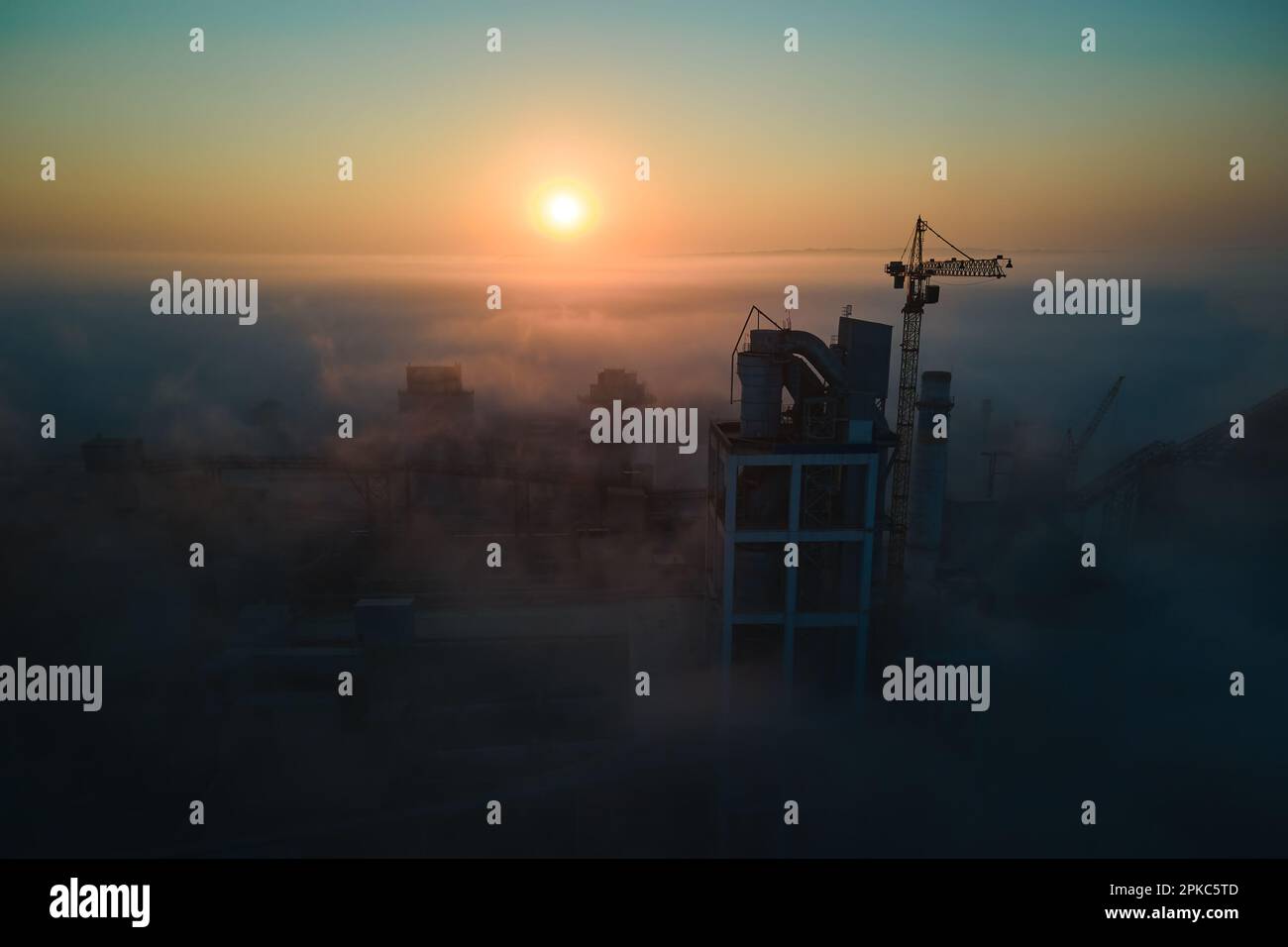 Aerial view of cement factory with high concrete plant structure and ...