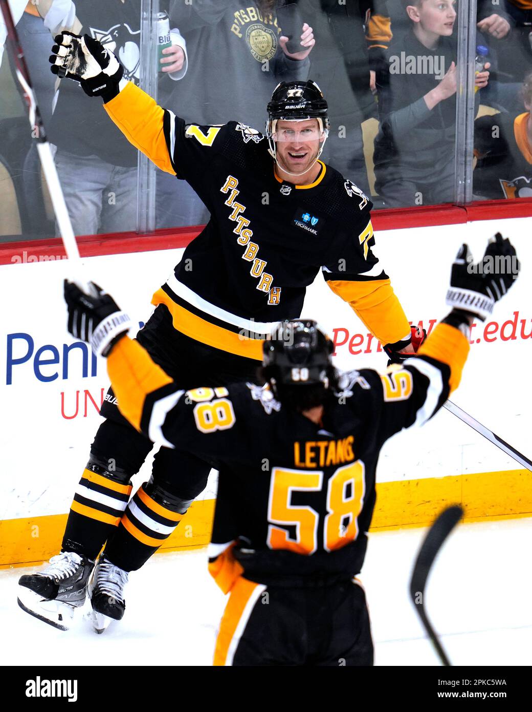 Pittsburgh Penguins' Jeff Carter (77) celebrates his goal with Kris ...