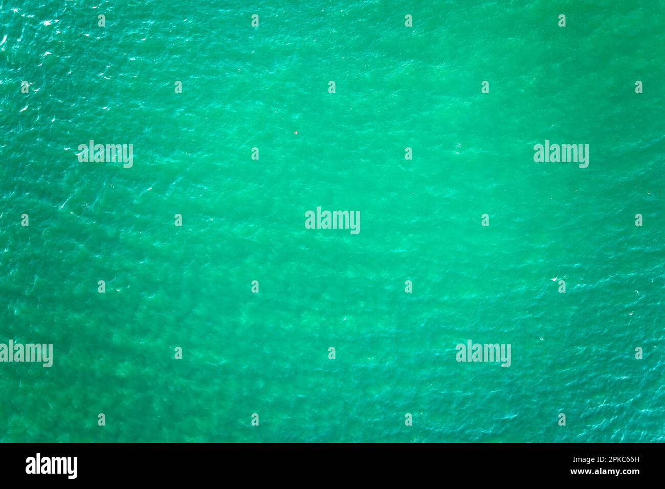 Aerial view of seascape surface of green sea water with small ripple ...