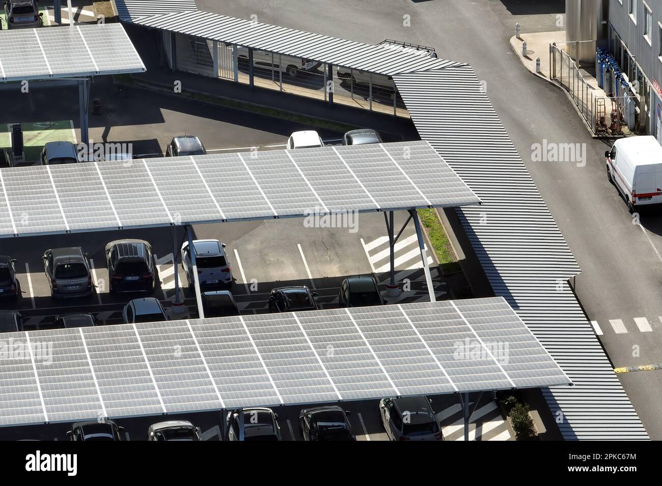 Aerial view of solar panels installed as shade roof over parking lot ...