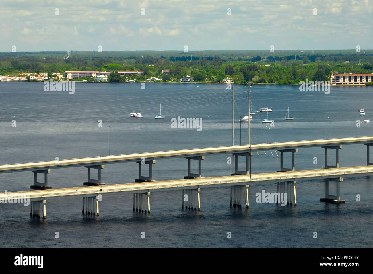 Barron Collier Bridge and Gilchrist Bridge in Florida with moving ...