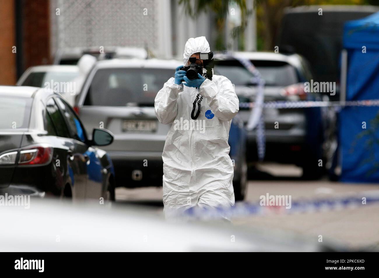 Forensic police at the scene of a police shooting, Newcastle, Friday ...