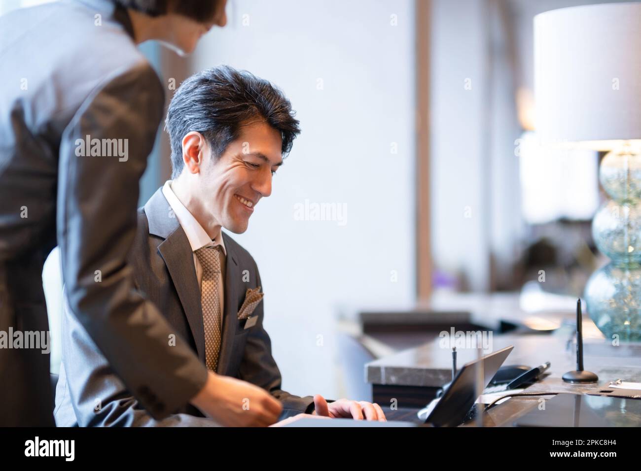 Hotel staff at work Stock Photo - Alamy