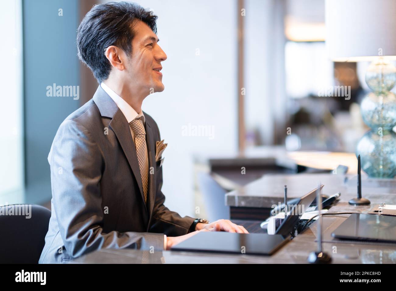 Hotel staff who deal with guests Stock Photo - Alamy