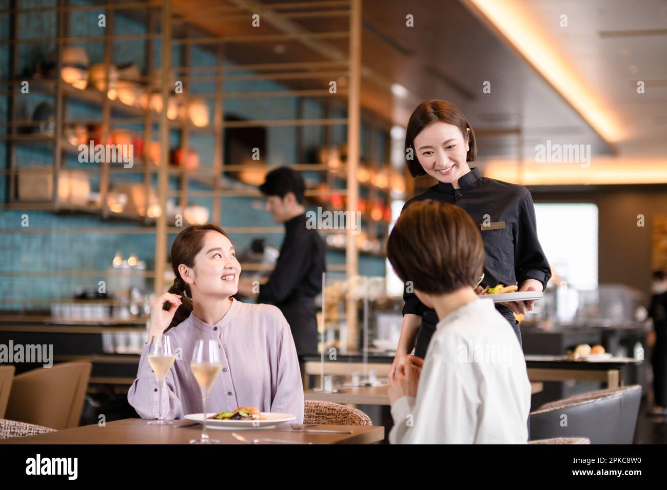 Woman explaining the meal Stock Photo - Alamy