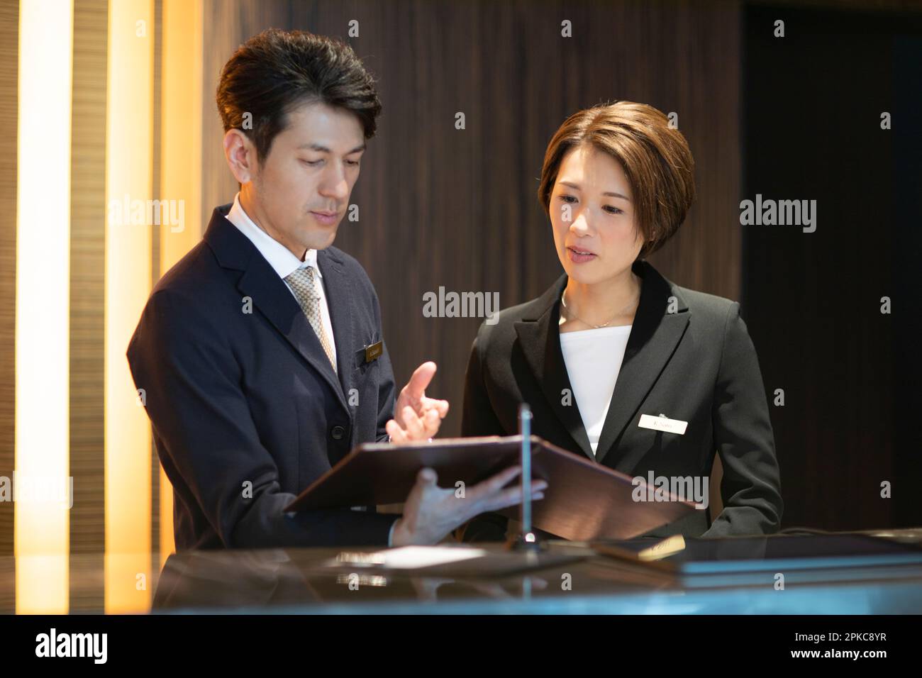 Hotel staff at work Stock Photo - Alamy