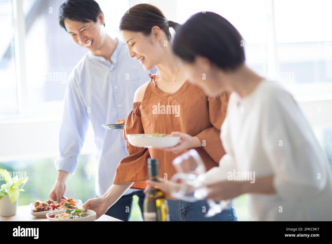 Japanese having a home party Stock Photo - Alamy