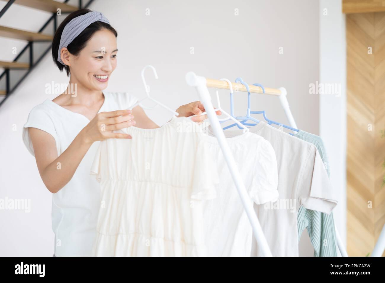 Woman Drying Laundry Stock Photo - Alamy