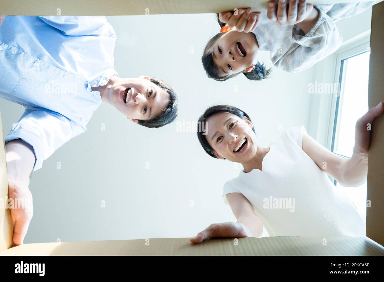 Family Peeping In Stock Photo - Alamy