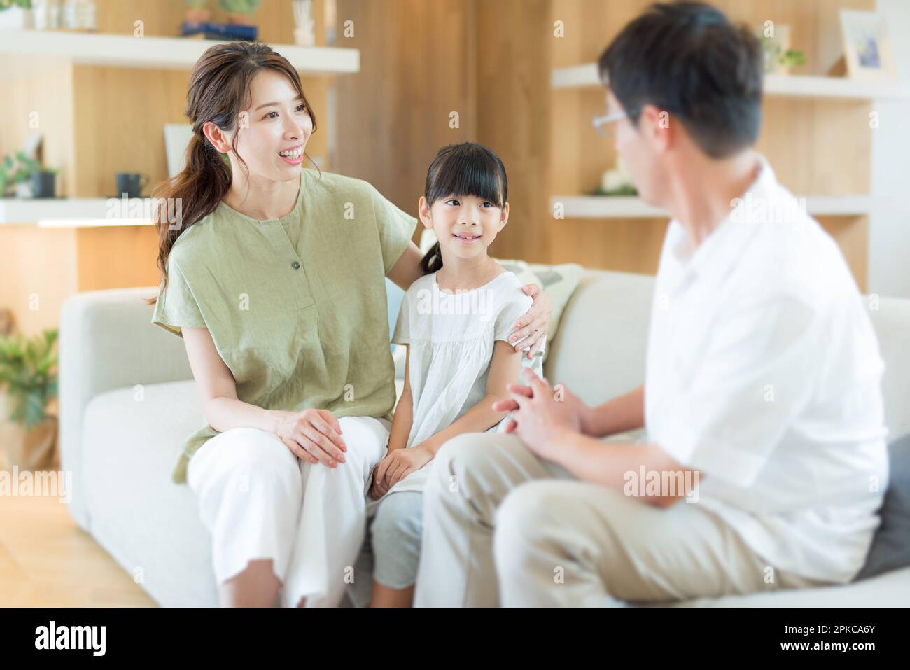 Asian woman talking to child hi-res stock photography and images - Alamy