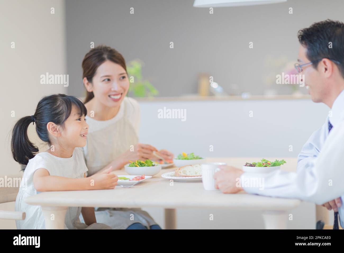 Family dining talking home hi-res stock photography and images - Alamy