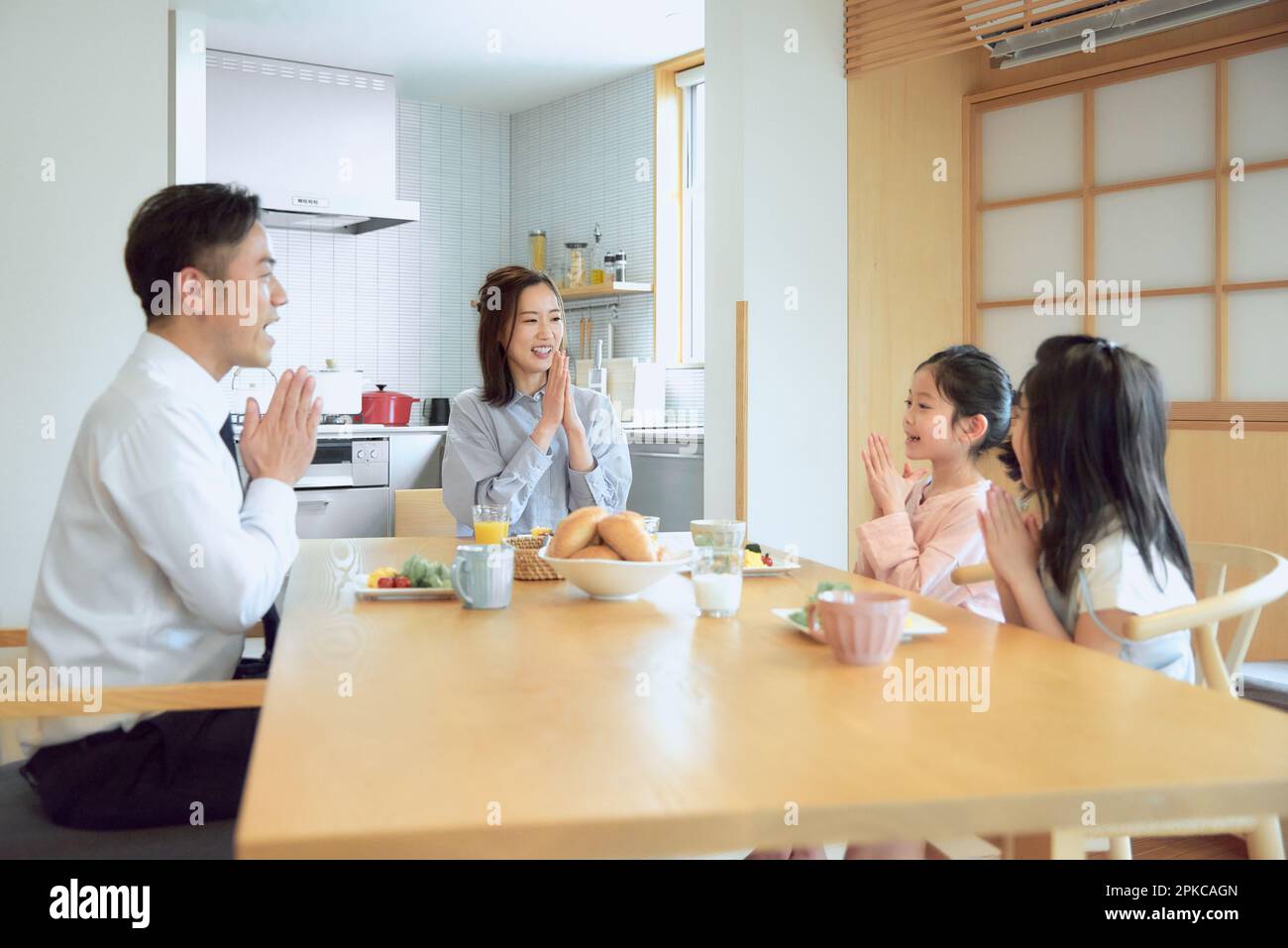 Family eating breakfast Stock Photo - Alamy