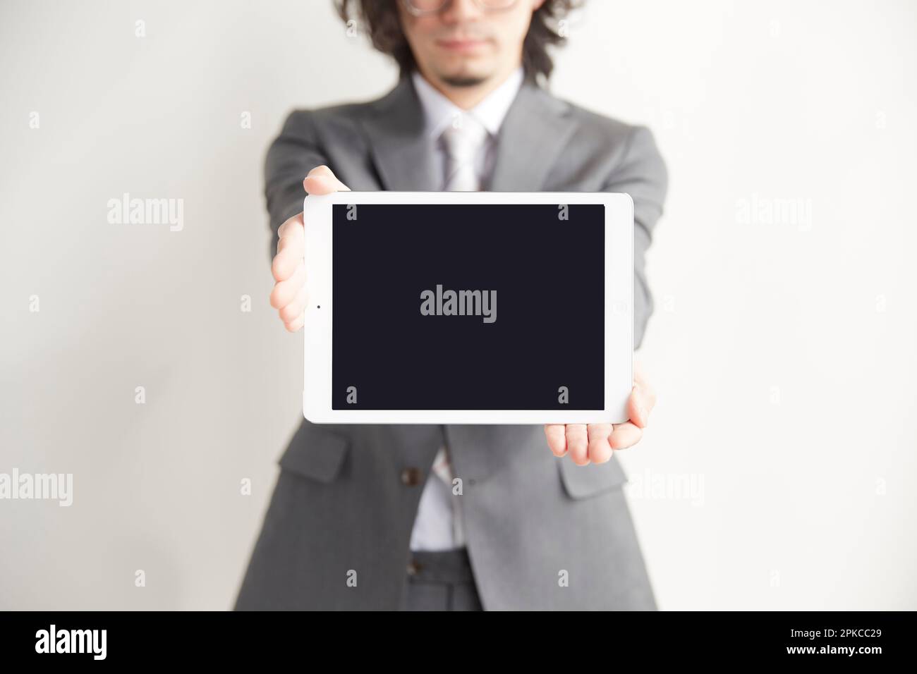 Holding ipad office hi-res stock photography and images - Alamy