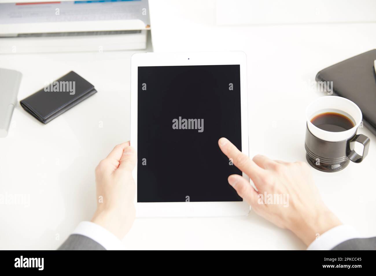 Consultant working tablet management hi-res stock photography and ...