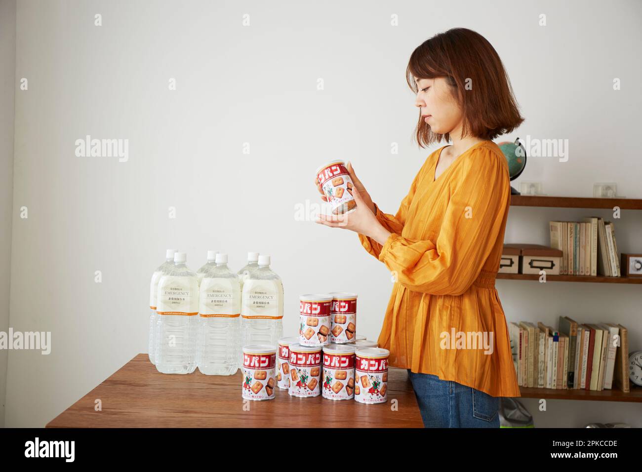Water and Kampan on the table Stock Photo - Alamy