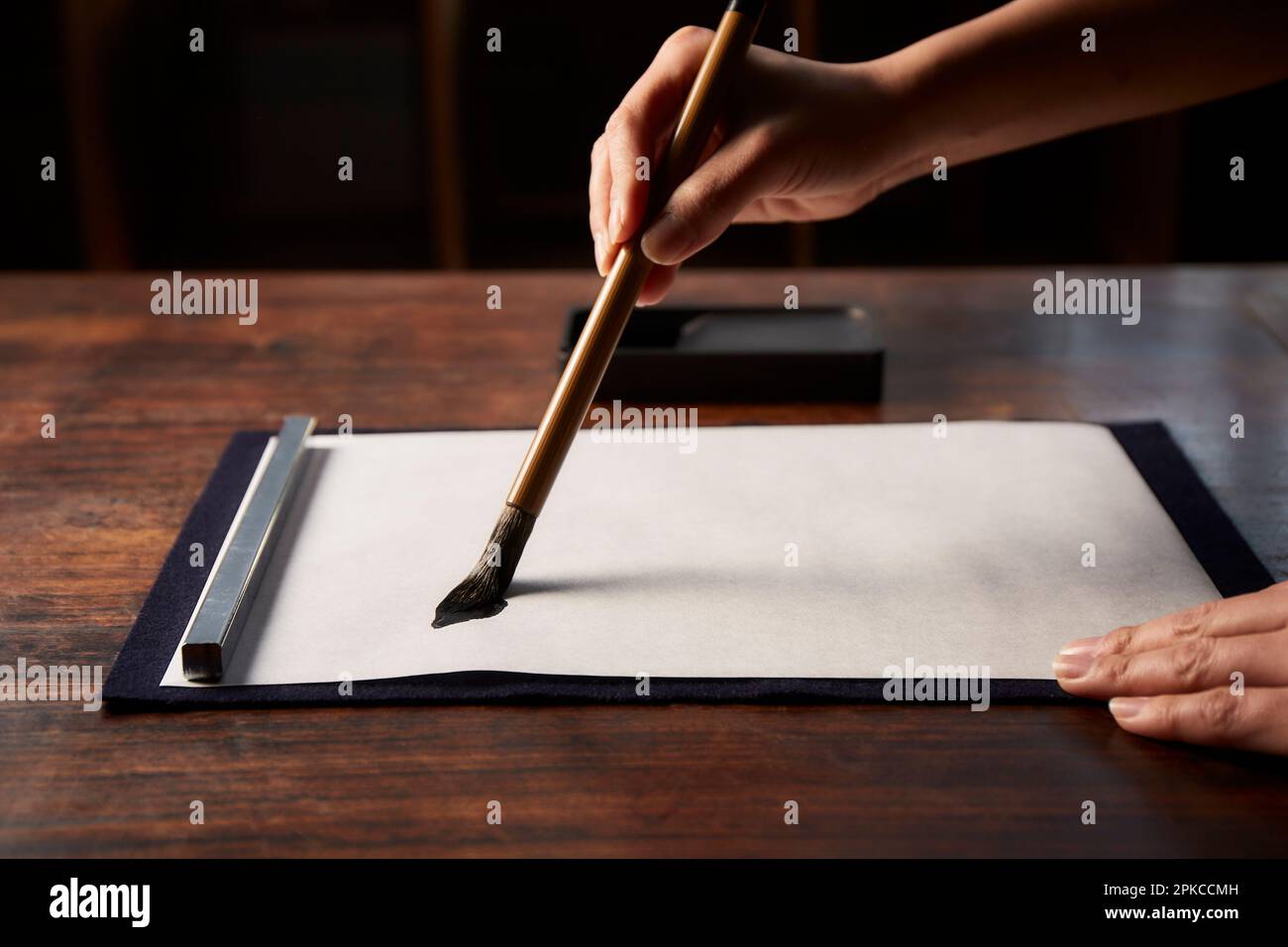 Woman doing calligraphy hi-res stock photography and images - Alamy
